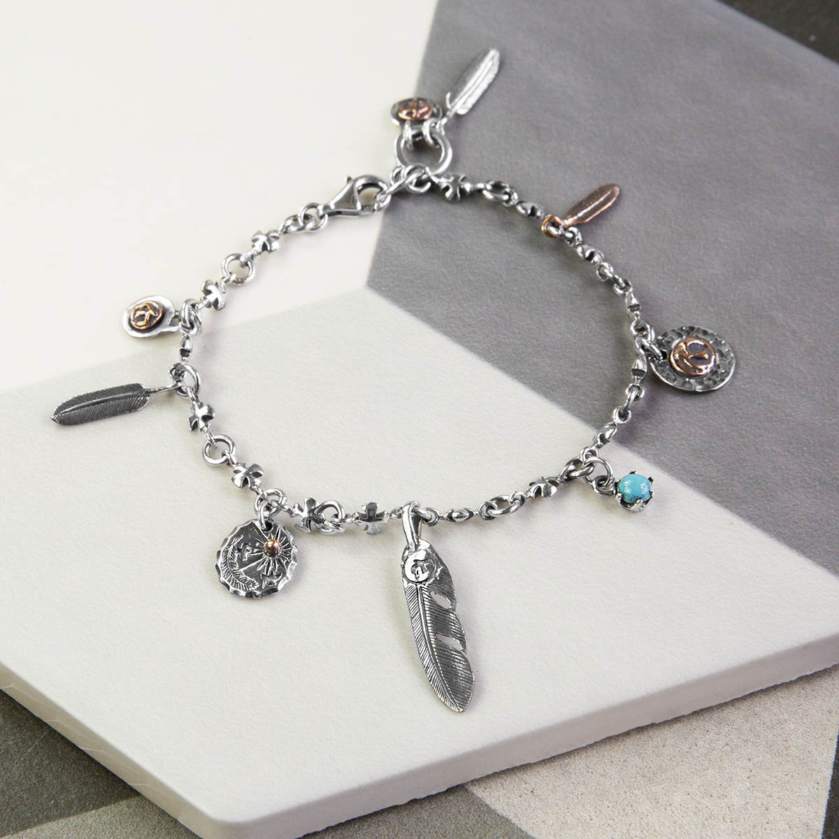 Sterling Silver Feathers Charm Bracelet | Martha Jackson