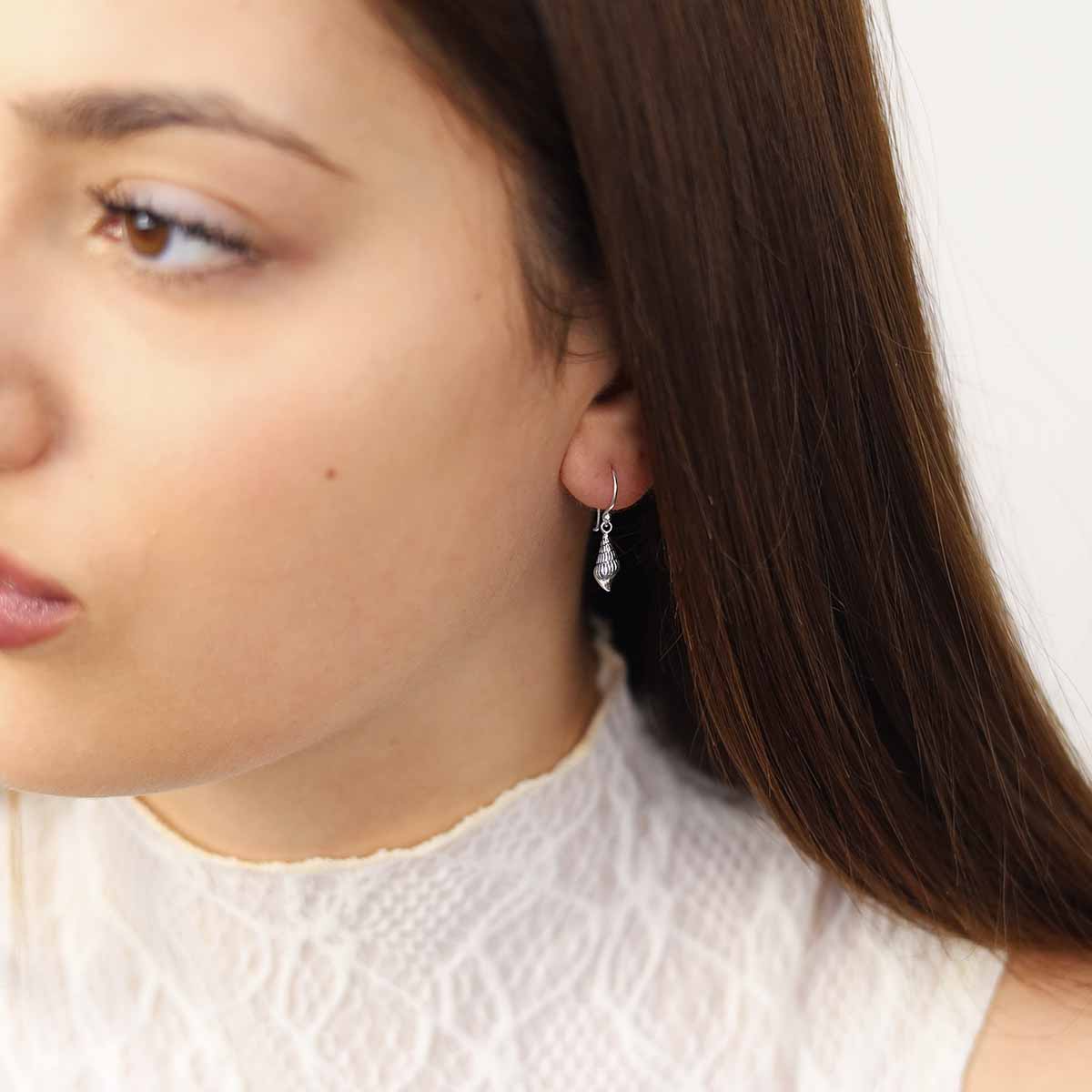 Sterling Silver Spiral Shell Dangly Earrings | Martha Jackson